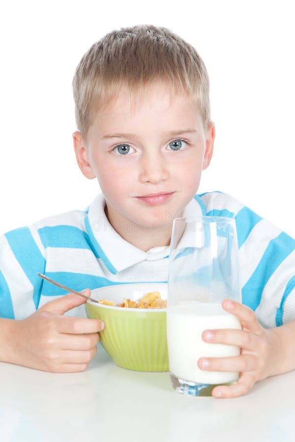 Little Boy Eating Breakfast at the Table Stock Photo - Image of happy ...