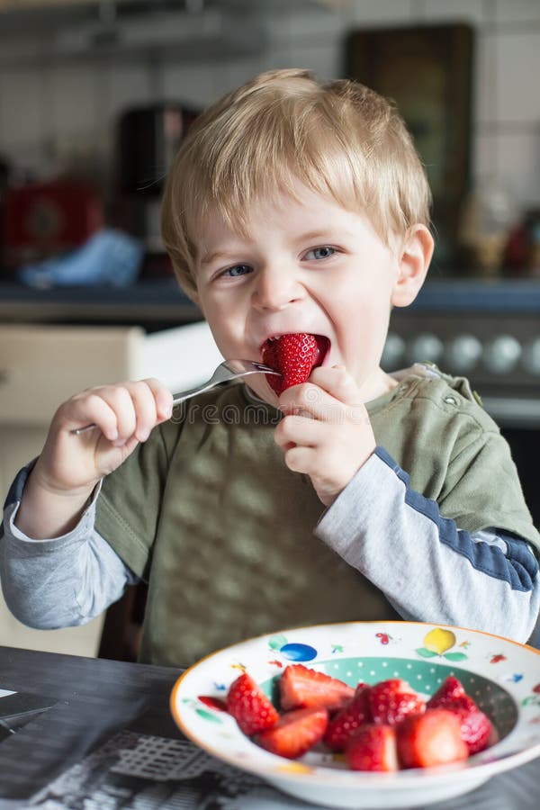 Little Boy Eating Fresh Strawberries Stock Image - Image of strawberry ...