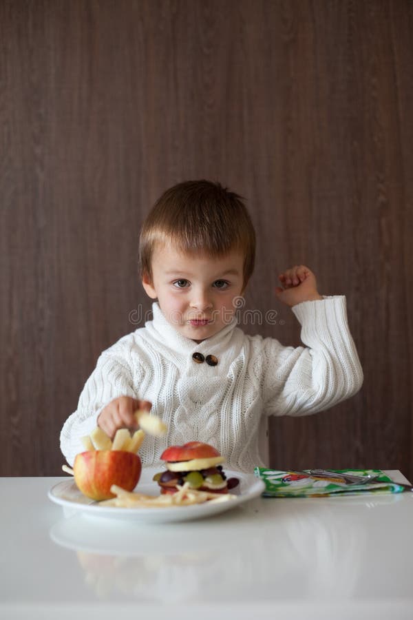 Little Boy, Eating Fruit Sanwich Stock Photo - Image of fruits, fork ...