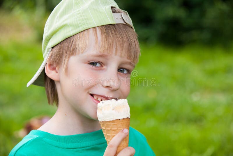 Little Boy Eating Ice Cream in the Park Outdoors Stock Image - Image of ...