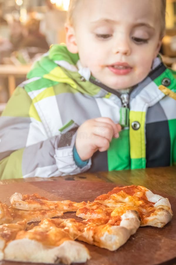 Adorable Little Boy Eating Pizza Restaurant Stock Photos - Free ...