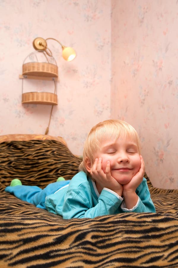 Little Boy Enjoying the Rest Stock Image - Image of dreaming, cosy ...