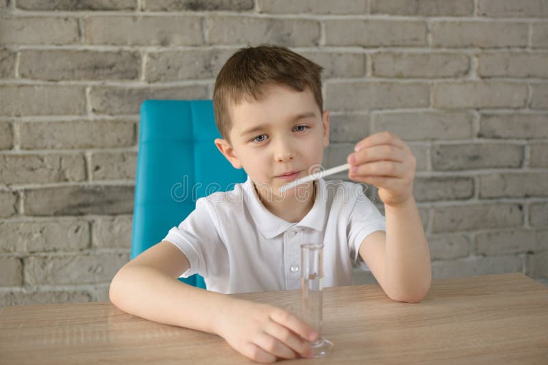 Little Boy Examines Water at Home. Stock Photo - Image of happy ...