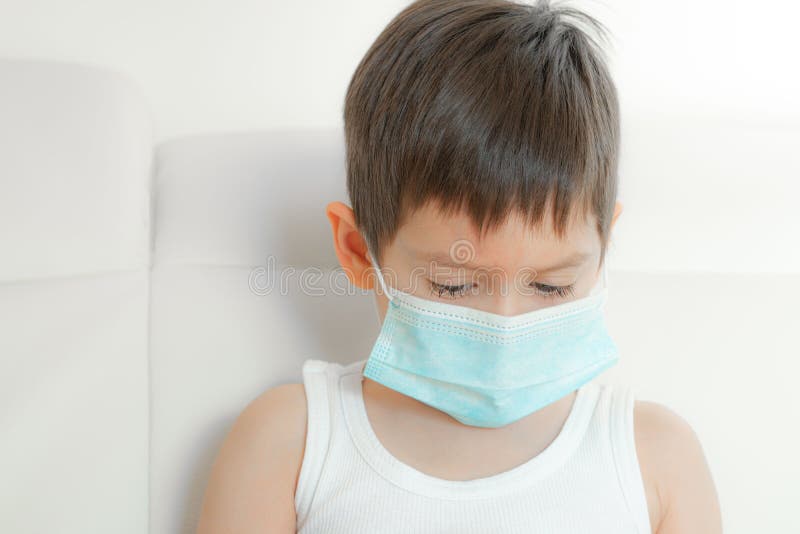 Little Boy with Face Mask Looking Down Stock Image - Image of patient ...