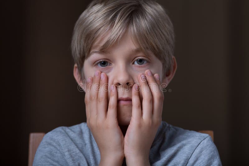 Little boy feeling afraid stock photo. Image of serious - 68327208