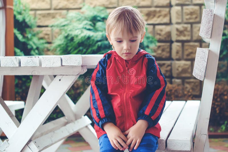 Little Boy Feeling Sad Outdoor, Terrace. Stock Image - Image of ...