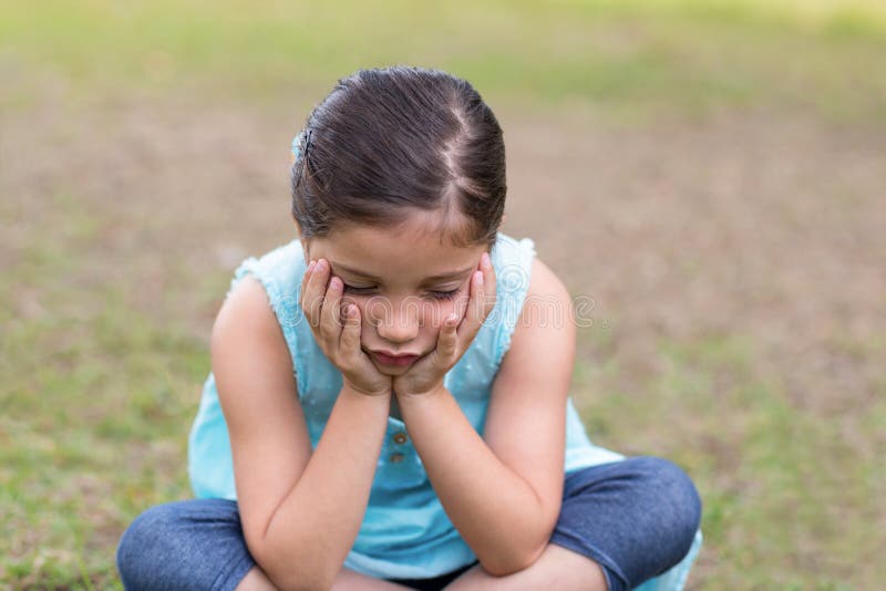 Little Boy Feeling Sad in the Park Stock Image - Image of casual ...
