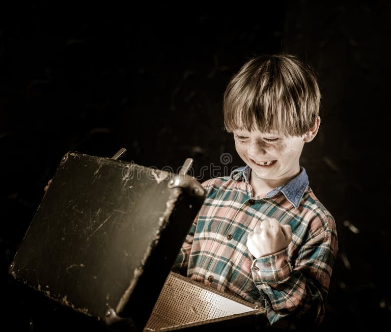 Little Boy Finding Treasure Stock Image - Image of light, expression ...