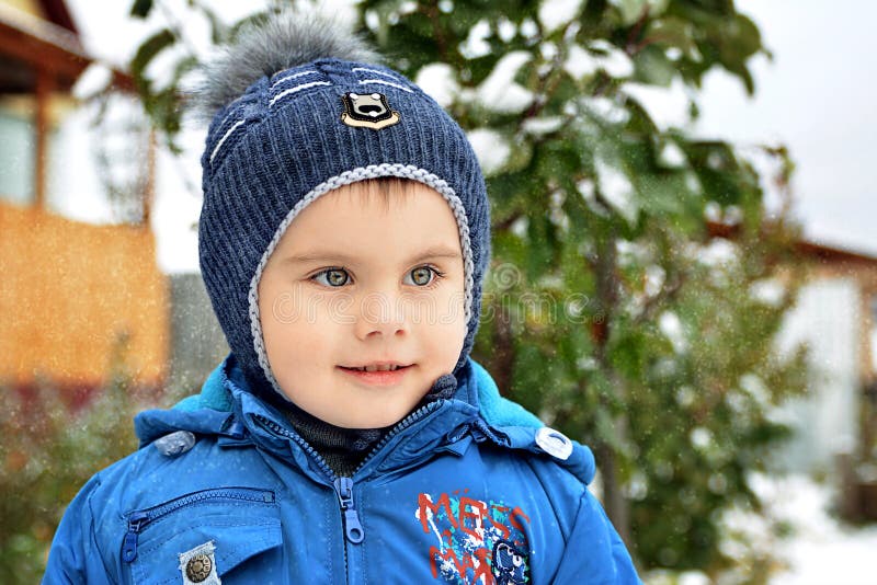 Little boy and first snow stock photo. Image of xmas - 78783274