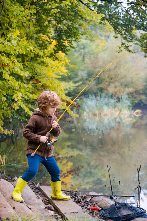 Little Boy Fishing. Kid Pulling Rod while Fishing on Weekend. Stock ...