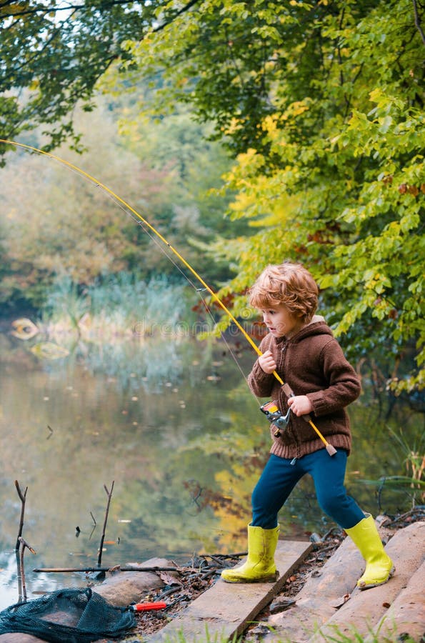 Little Boy Fishing. Kid Pulling Rod while Fishing on Weekend. Stock ...