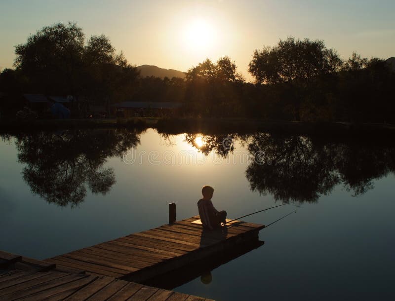 Little Boy Fishing at Sunset Pond Stock Image - Image of nature, river ...