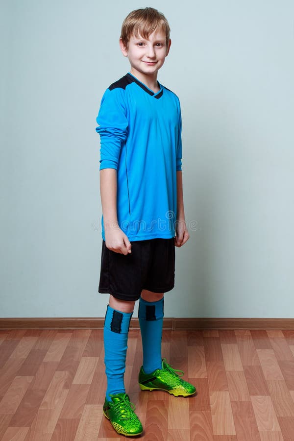 Little Boy in Football Uniform Smiling Stock Image - Image of sport ...