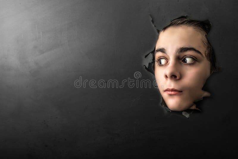 Boy with frightened look stock photo. Image of conceptual - 112571414