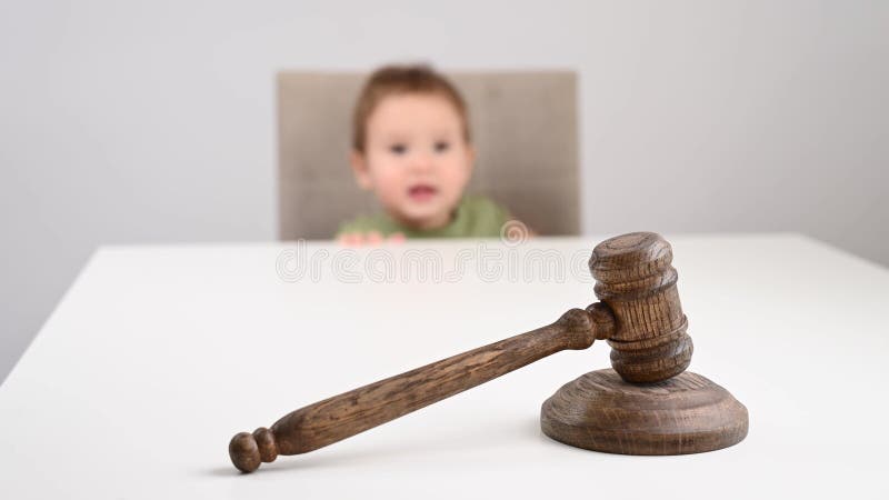 Little Boy in Front of a Judge S Gavel. Stock Video - Video of custody ...