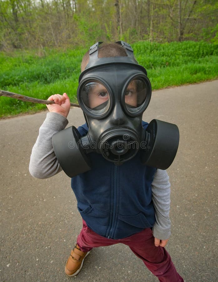 Little Boy in a Gas Mask on the Forest Road Stock Photo - Image of ...