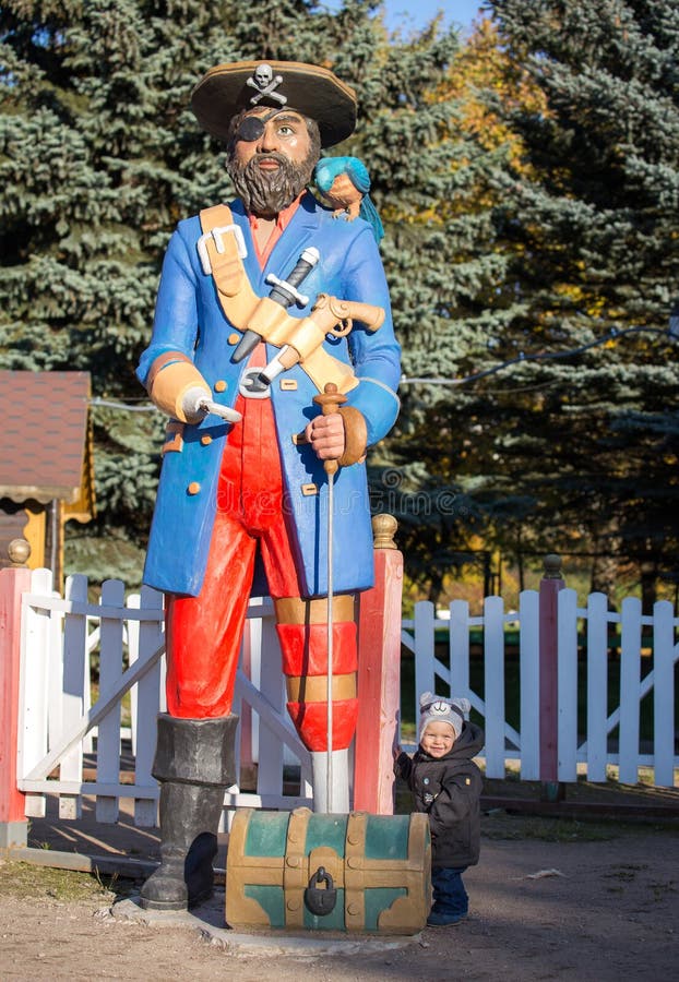 Little Boy and Giant One Legged Pirate Stock Image - Image of autumn ...