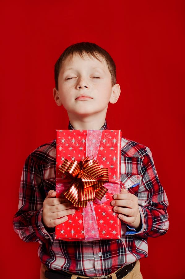 Little boy with gift box stock photo. Image of human - 48937898