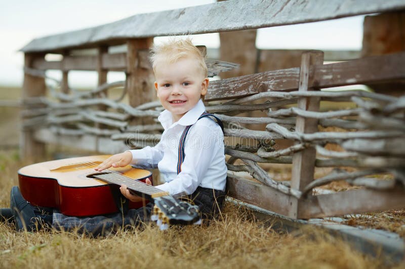 Little Boy Guitar Location Stock Photos - Free & Royalty-Free Stock ...