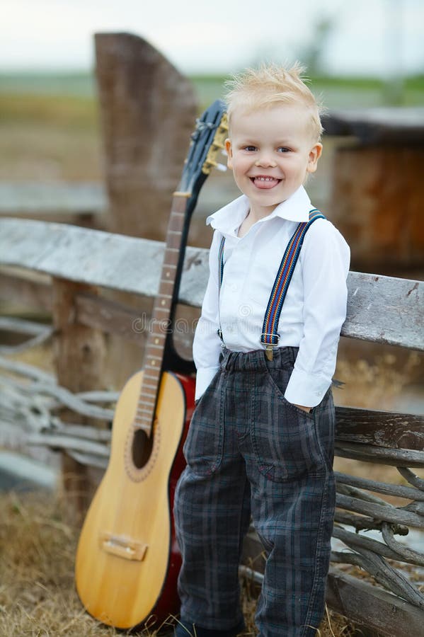 Little Boy Guitar Location Stock Photos - Free & Royalty-Free Stock ...