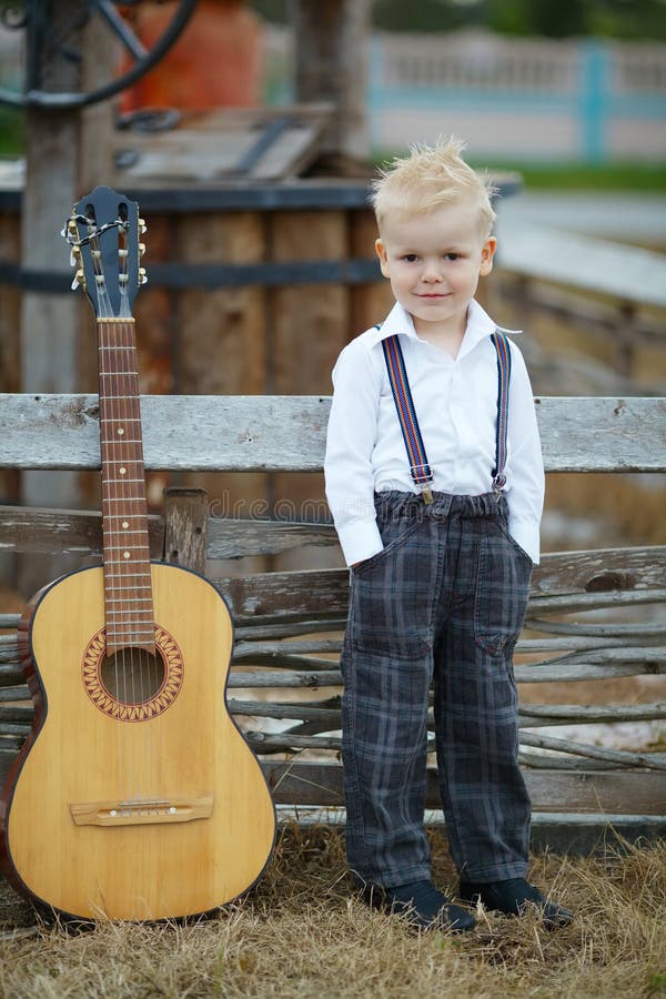 Little Boy Guitar Location Stock Photos - Free & Royalty-Free Stock ...