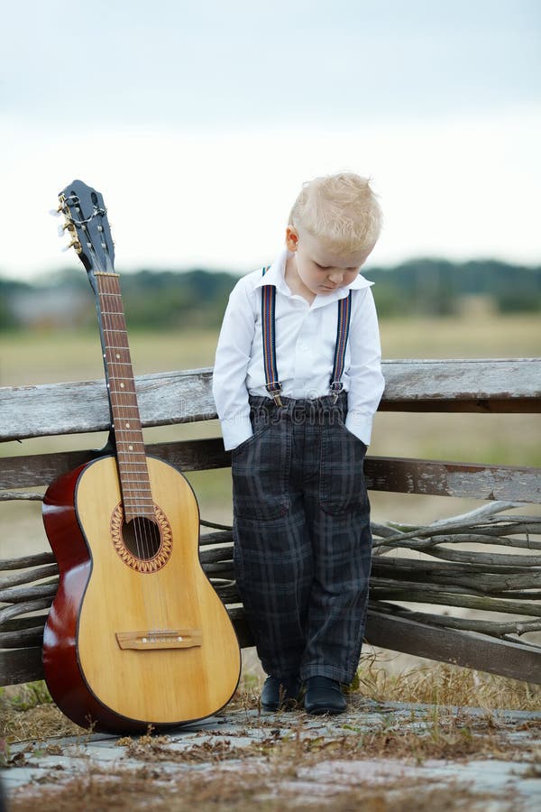 Little Boy Guitar Location Stock Photos - Free & Royalty-Free Stock ...