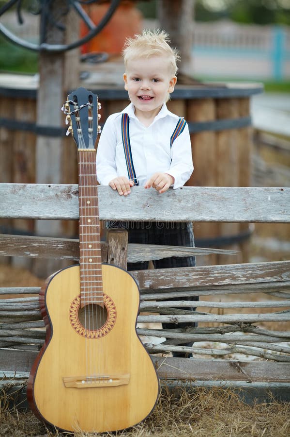 Boy hitch hiking at road stock photo. Image of little - 35007096