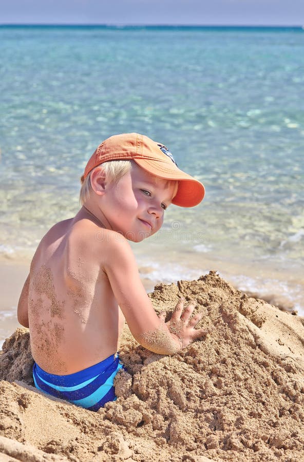 Little Boy Have Fun Digging Sand Stock Photos - Free & Royalty-Free ...