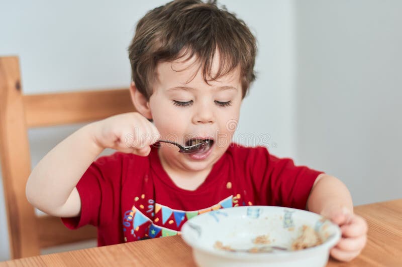 Little Boy Having Fun at Breakfast Stock Image - Image of child ...