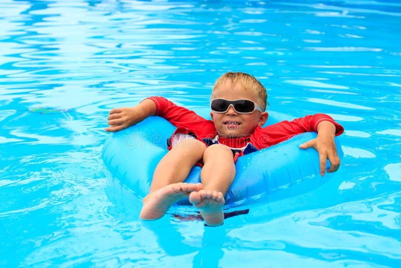 Little Boy Having Fun in the Swimming Pool Stock Photo - Image of ...
