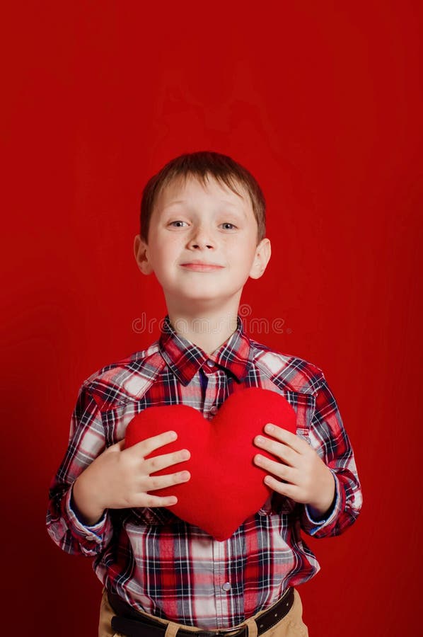Little Boy with a Heart of Toy Stock Photo - Image of cheerful ...