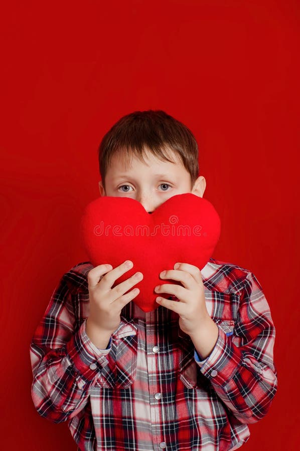 Little Boy with a Heart of Toy Stock Photo - Image of cheerful ...