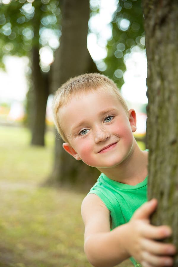 Little boy hiding stock image. Image of playful, happy - 51300473