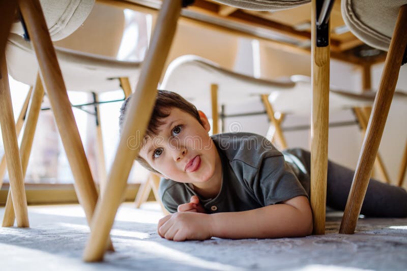 442 Boy Under Chair Stock Photos - Free & Royalty-Free Stock Photos ...
