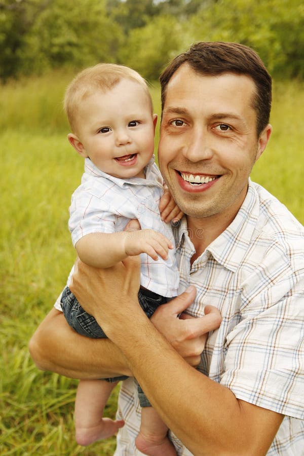 Little Boy with His Father on the Nature Stock Photo - Image of male ...