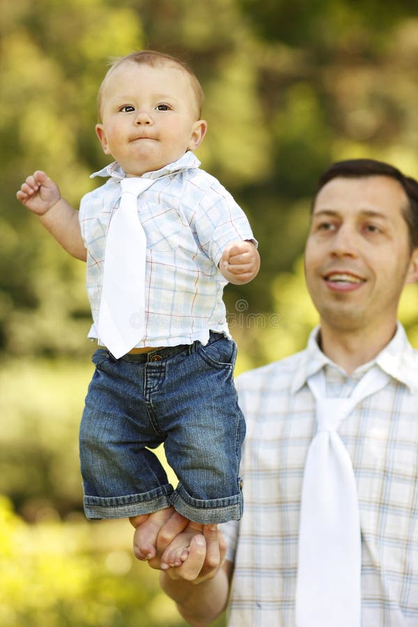 Little Boy with His Father on the Nature Stock Image - Image of ...