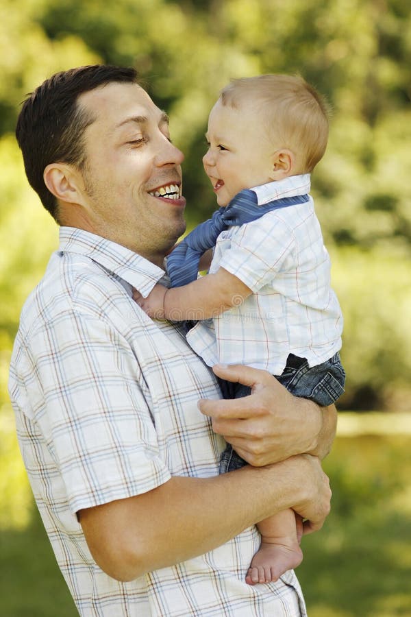 Little Boy with His Father on the Nature Stock Image - Image of small ...