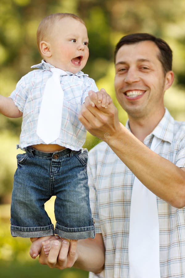 Little Boy with His Father on the Nature Stock Image - Image of cute ...