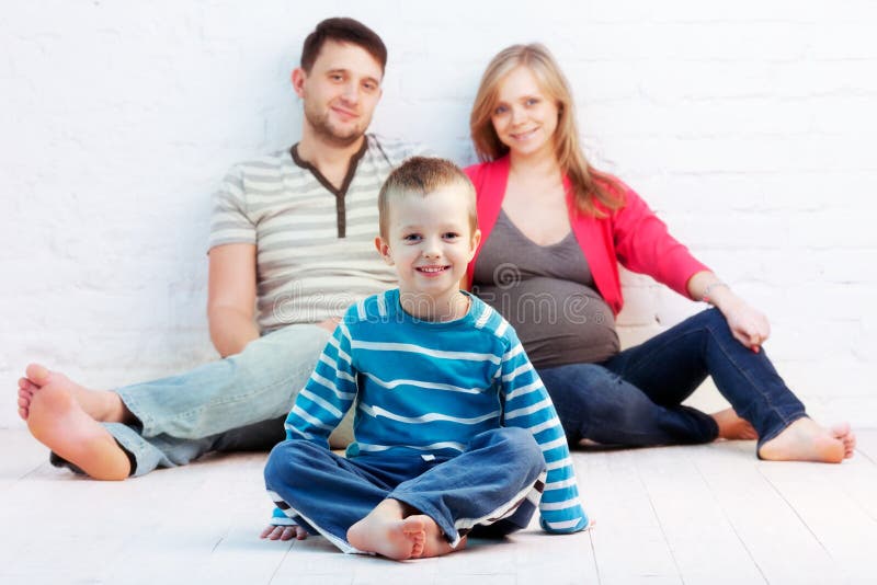Little boy and his parents stock image. Image of parent - 19980751