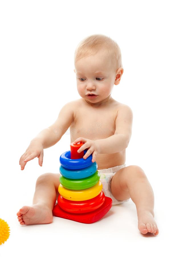 Little boy with his toys stock photo. Image of child - 23946562
