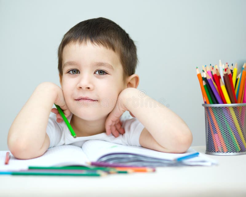 Little Boy is Holding Color Pencils Stock Photo - Image of closeup ...