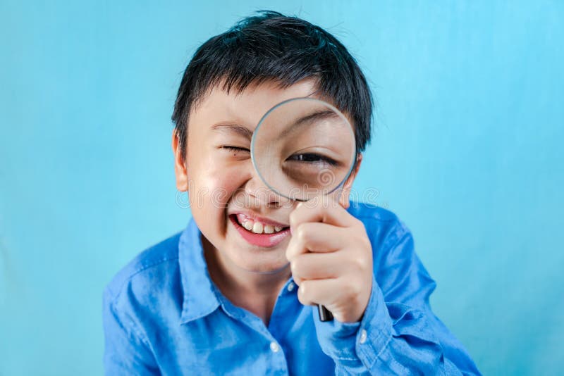 Little Boy Holding Magnifying Glass Stock Photo - Image of happy, hand ... Little Boy Holding Magnifying Glass Stock Photo - Image of happy, hand ...
