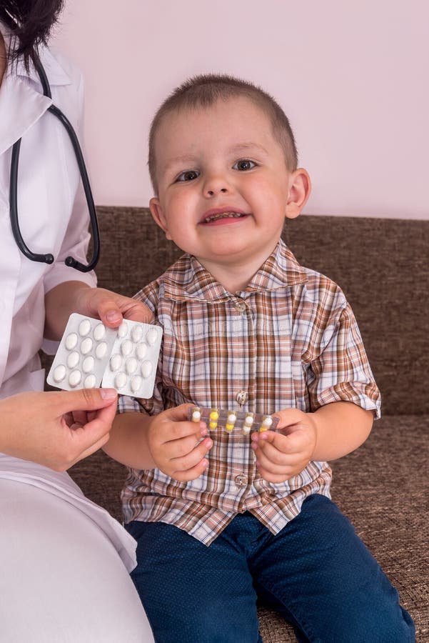 Little Boy Holding Pills in Blister in Hands Stock Image - Image of ...