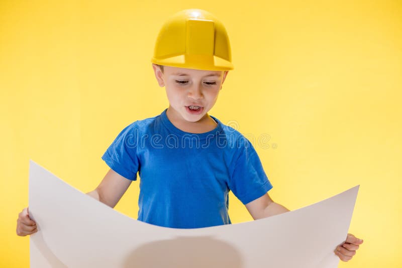 A Little Boy Holding Plan Project in His Hands Dreams of Becoming a ...