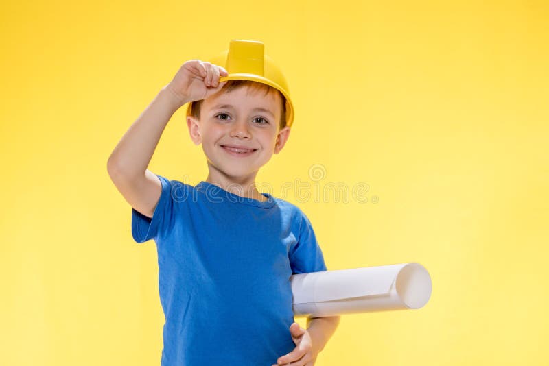 A Little Boy Holding Plan Project in His Hands Dreams of Becoming a ...