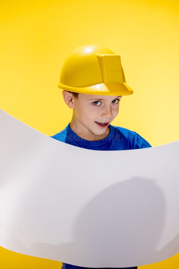 A Little Boy Holding Plan Project in His Hands Dreams of Becoming a ...