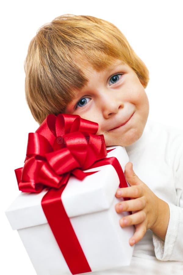 Excited Boy Holding a Wrapped Present Stock Photo - Image of birthday ...