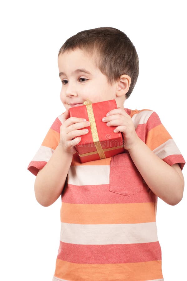 Little boy holds his gift stock image. Image of gift - 18040171