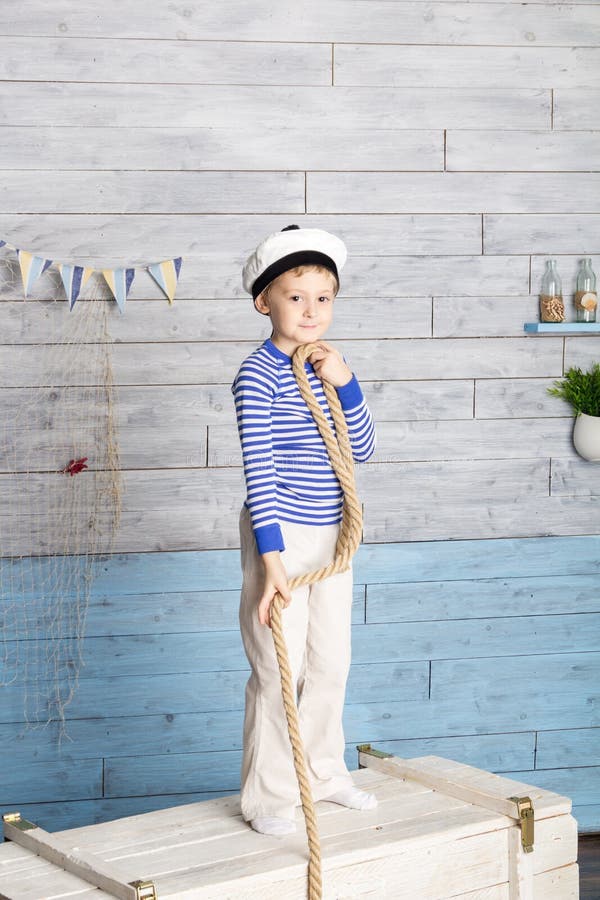 Little Boy Holds Marine Rope Stock Image - Image of nautical, maritime ...