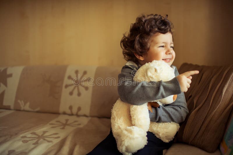 Little boy at home stock photo. Image of comfort, curly - 28294284